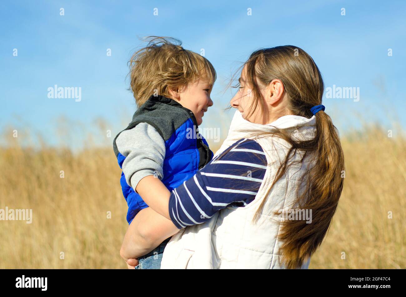 mother and child in the field outdoors Stock Photo - Alamy