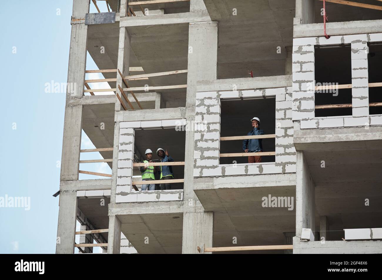 Wide angle background image of high rise construction site, copy space ...