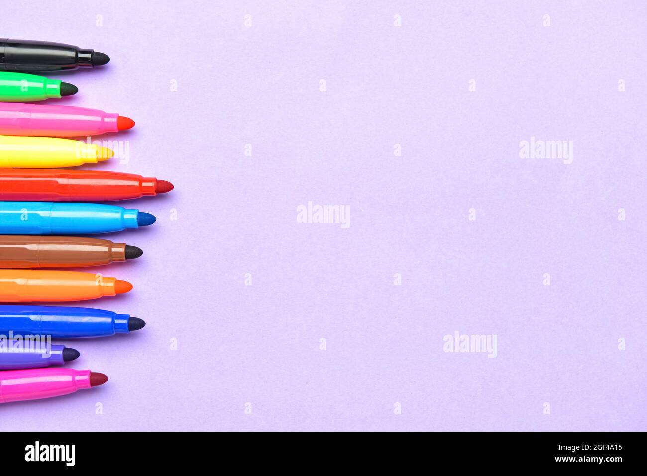 Colorful markers on color background Stock Photo - Alamy