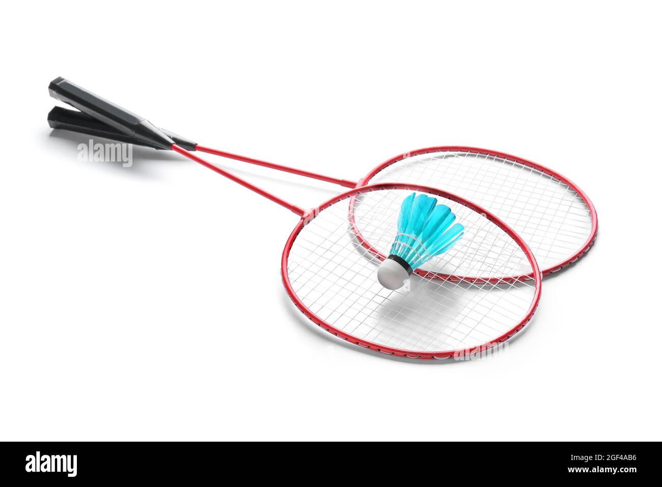 Badminton rackets and shuttlecock on white background Stock Photo - Alamy