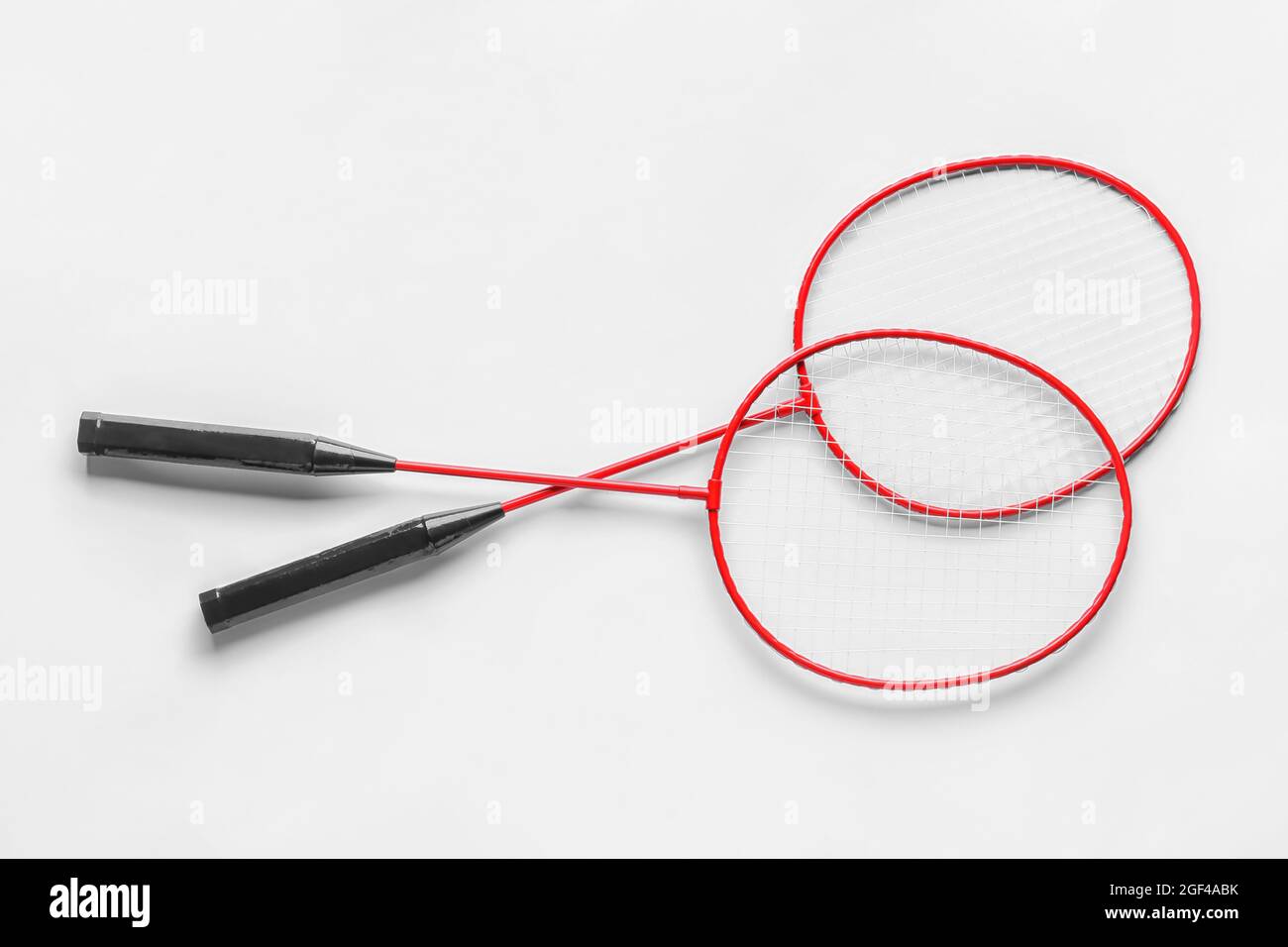 Badminton rackets on white background Stock Photo - Alamy