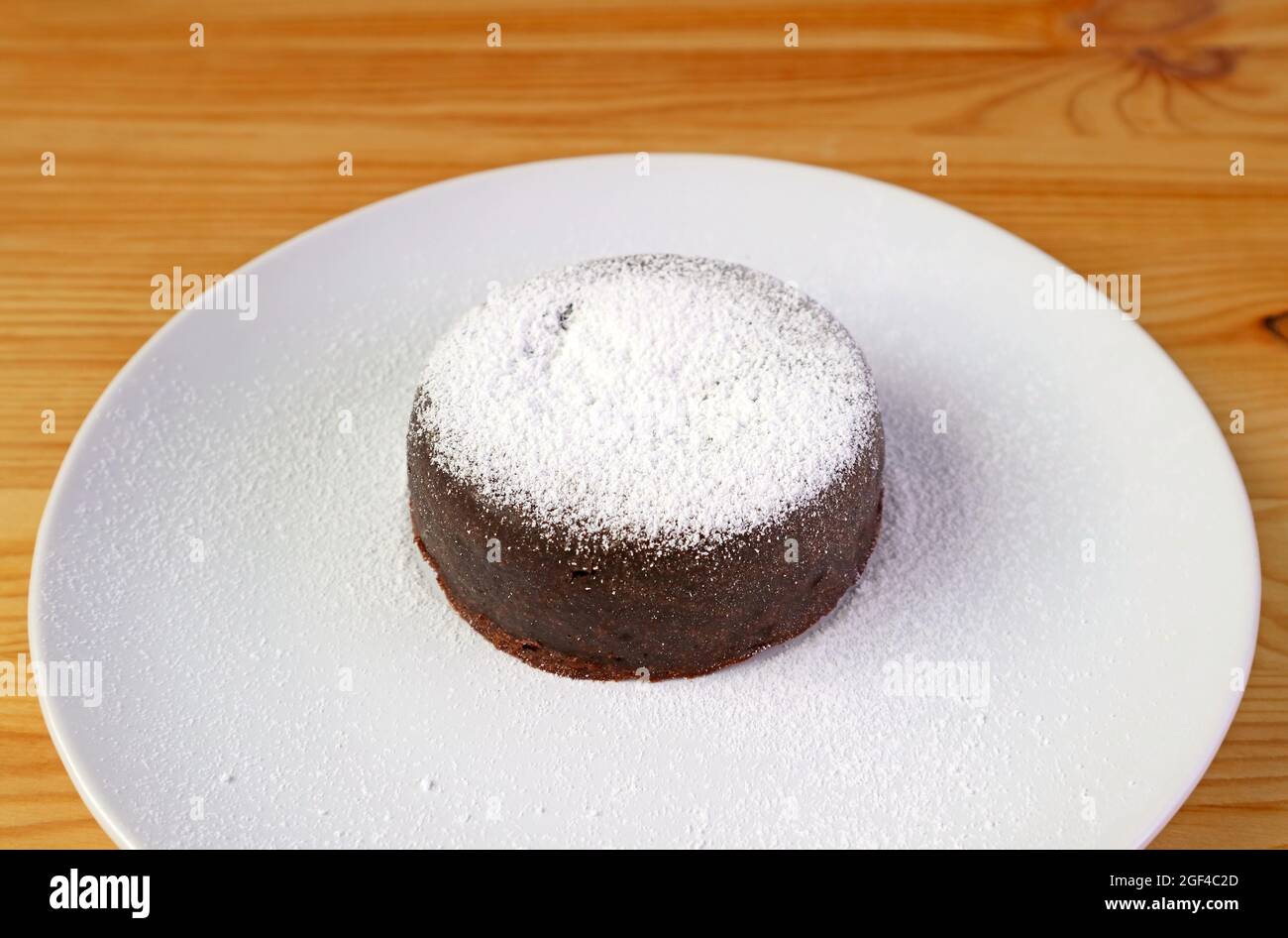 Homemade Rich and Moist Mini Chocolate Cake Sprinkled with Icing Sugar ...