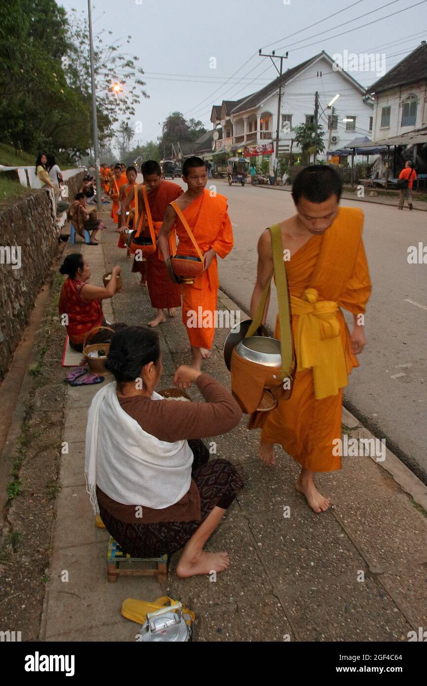Local People Offering Food at Alms, Luang Prabang, Laos Stock Photo - Alamy