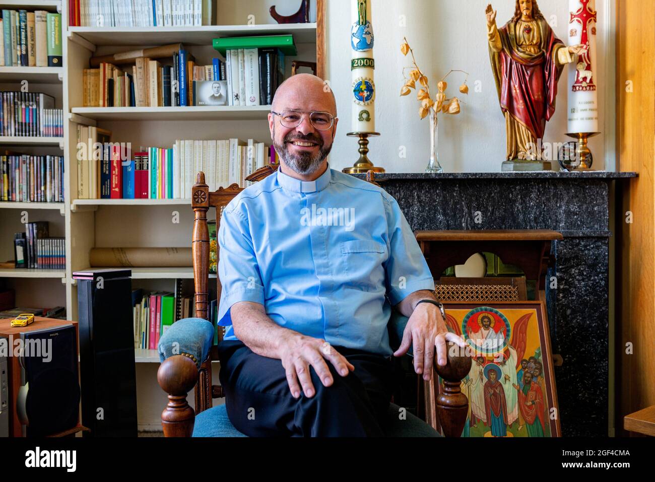 Tilburg, Netherlands. Living Room Portrait of a 56 year old Catholic ...
