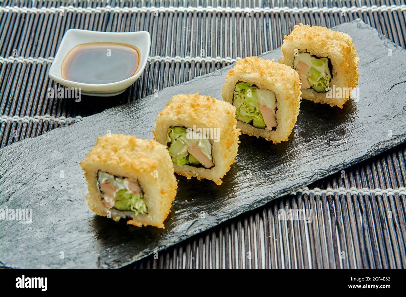 delicious hot rolls with chicken on a stone stand Stock Photo - Alamy