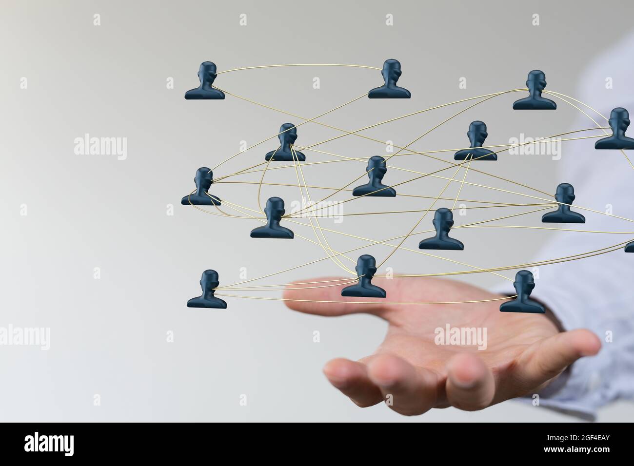 Businessman holding the virtual 3D network icons symbolizing ...