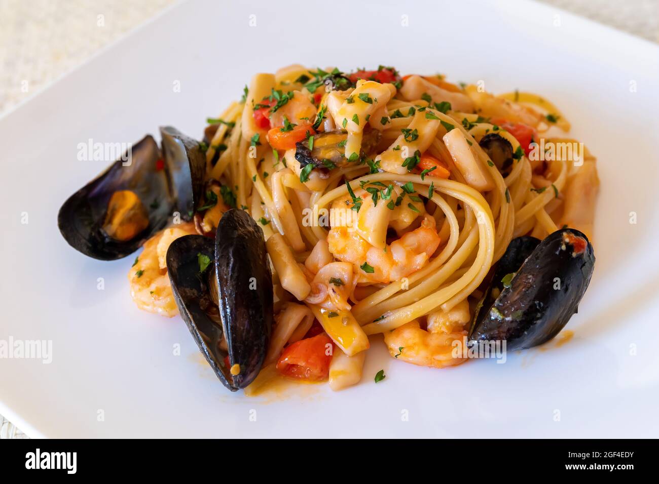 Linguine with seafood. Typical dish of Italian cuisine consisting of ...