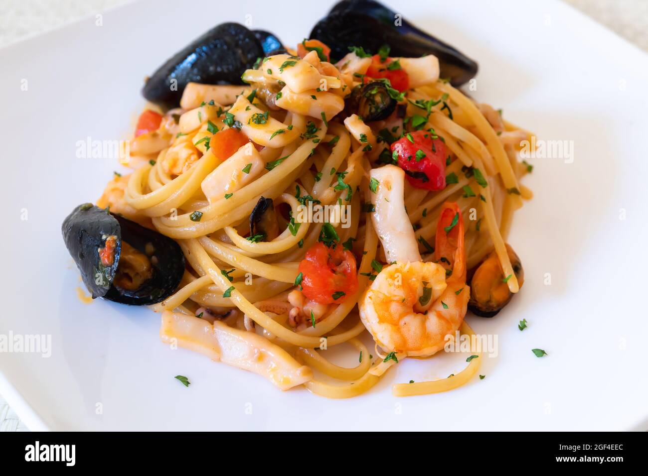 Linguine with seafood. Typical dish of Italian cuisine consisting of ...