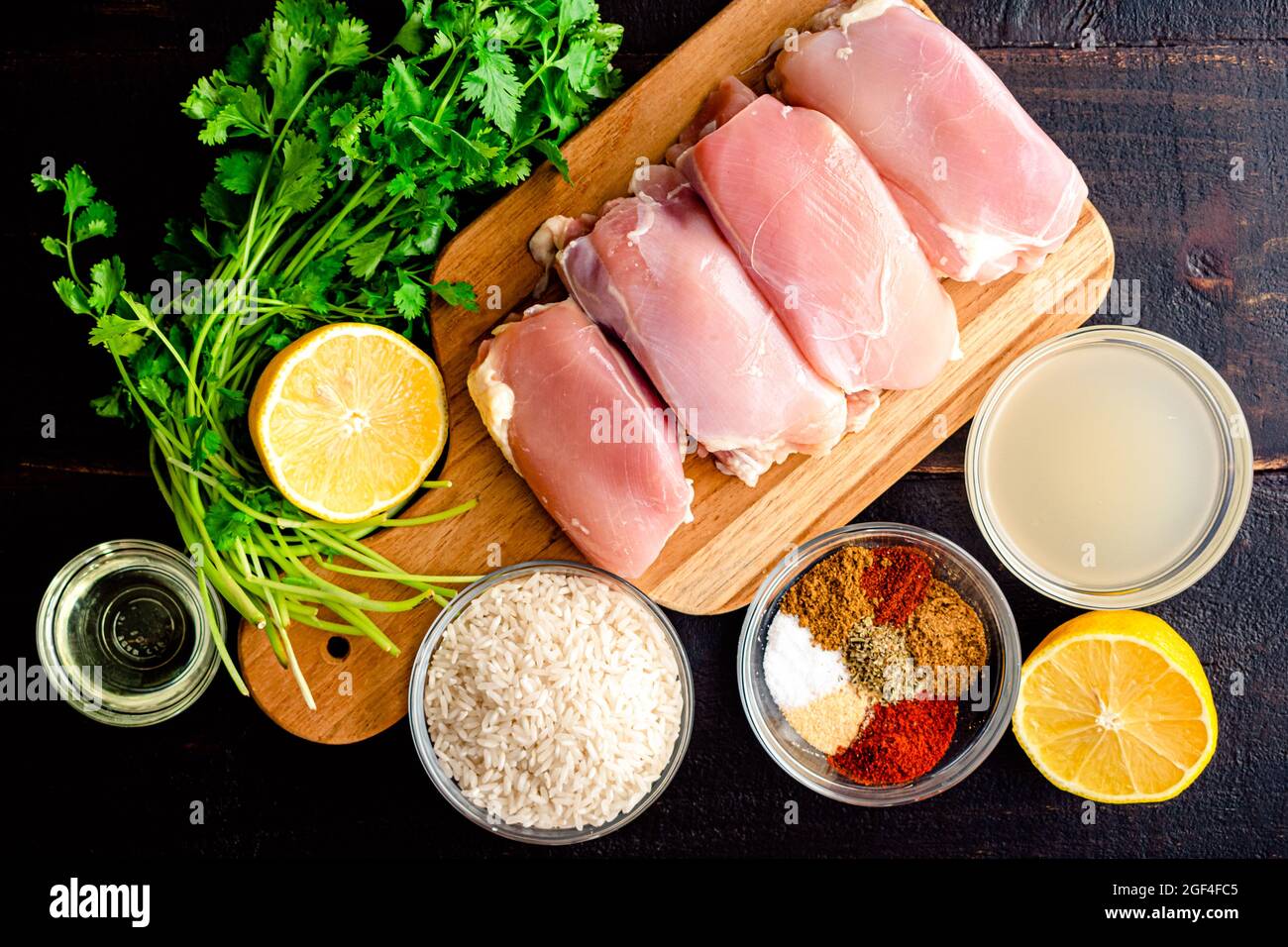 One Pan Spanish Chicken and Rice Ingredients: Raw chicken thighs, rice ...