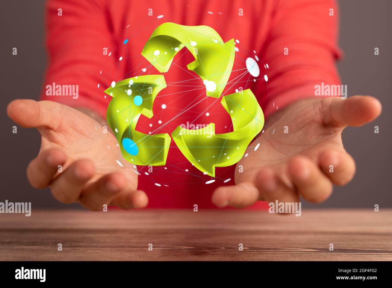 3d rendered sign of recycling in hands Stock Photo - Alamy