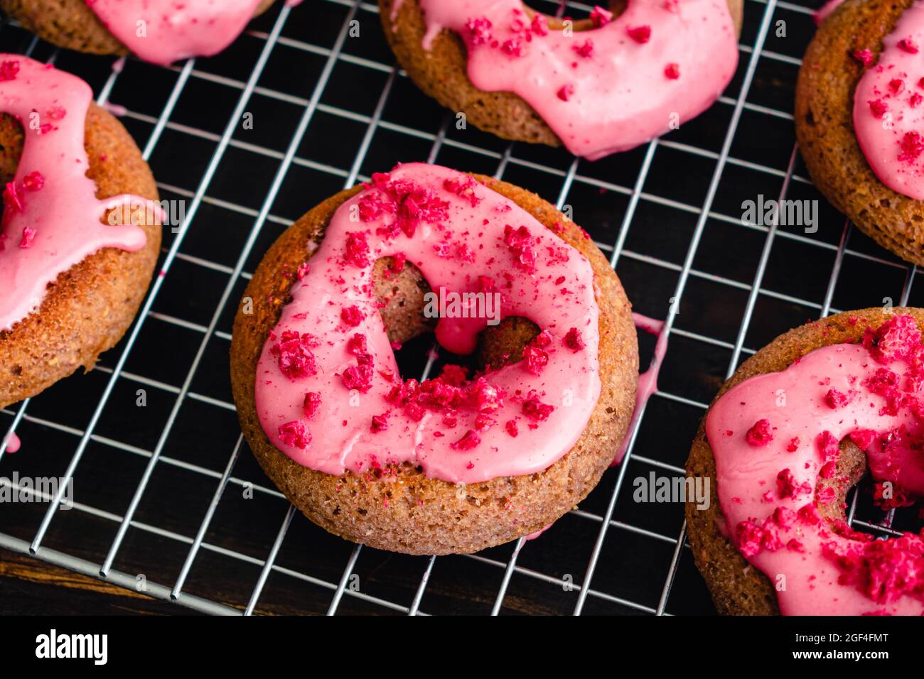 Raspberry Baked Donuts with Raspberry Glaze on a Wire Cooling Rack ...