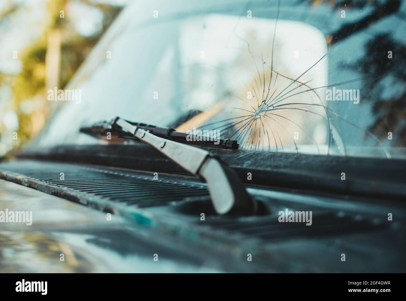 Closeup of a windshield wiper on a broken glass Stock Photo - Alamy