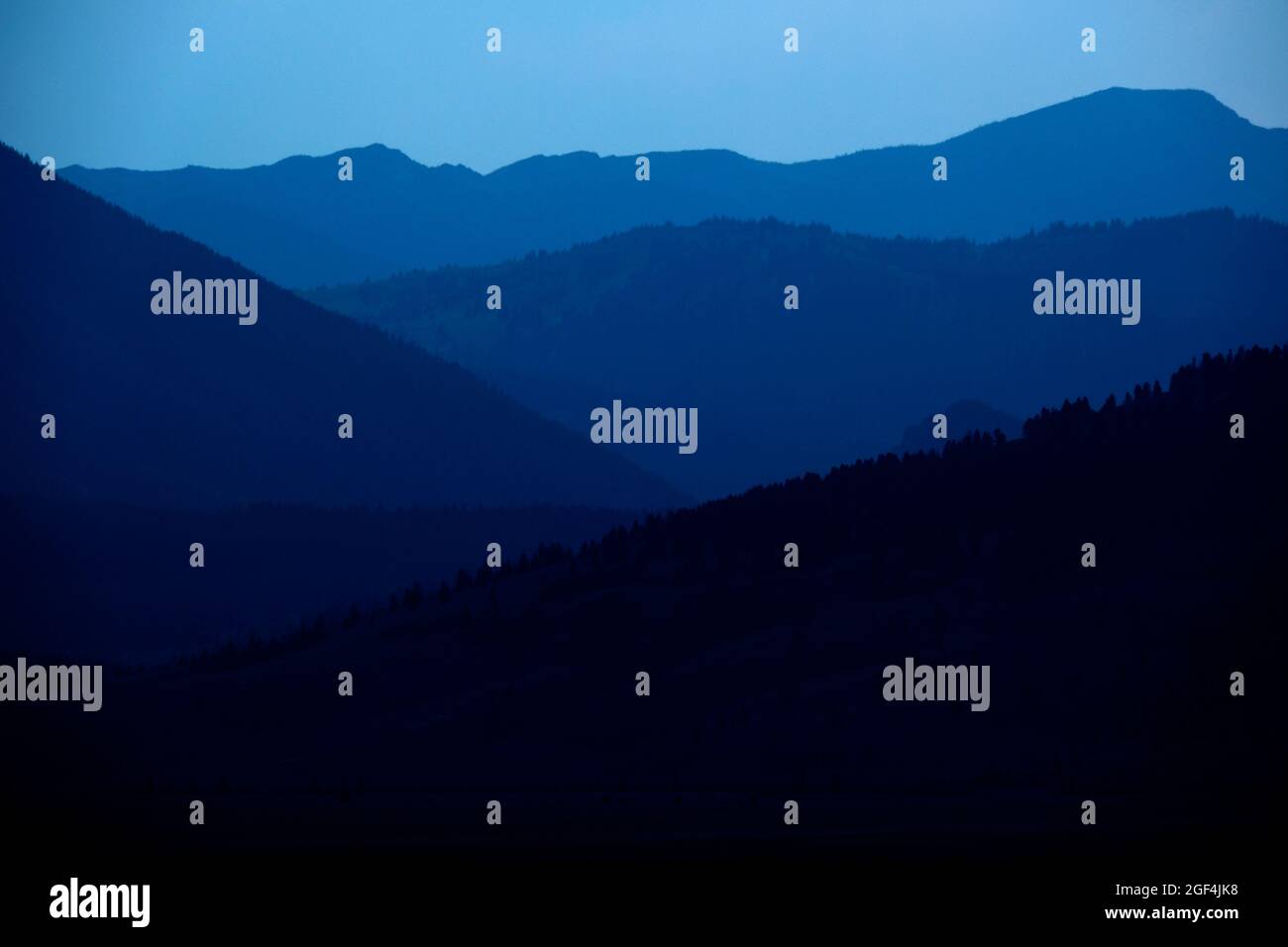 Layers of mountain in wilderness distant smoke or mist Stock Photo - Alamy