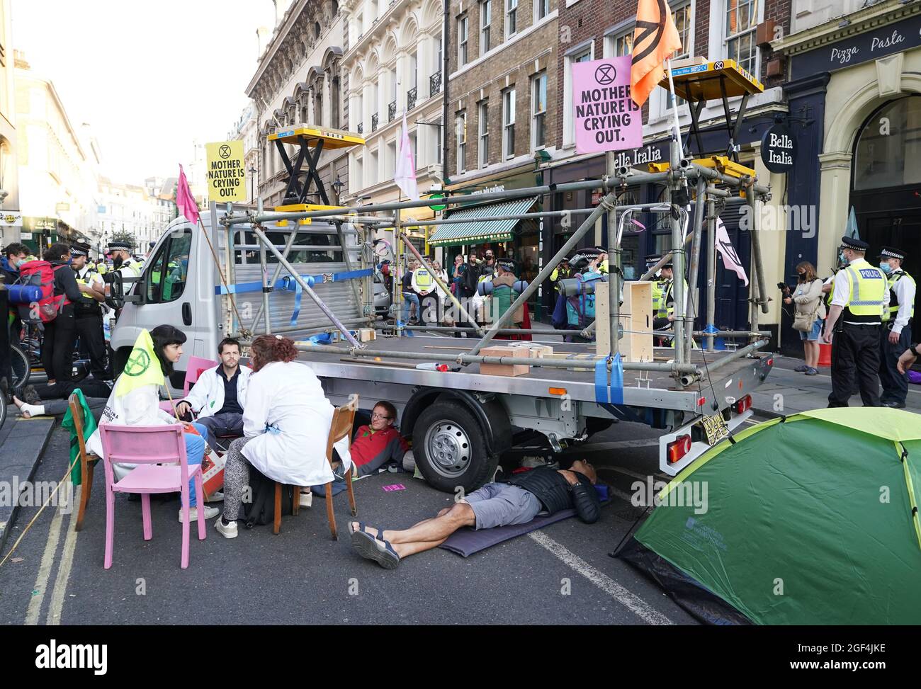 Demonstrators block a Garrick Street in central London during a protest ...