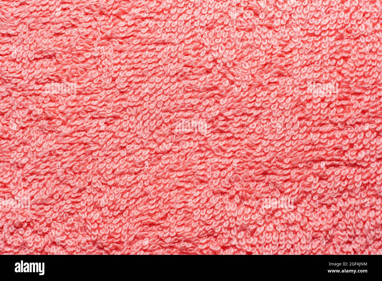 Textile. The texture is pink with straight lines and weave. Close-up of ...