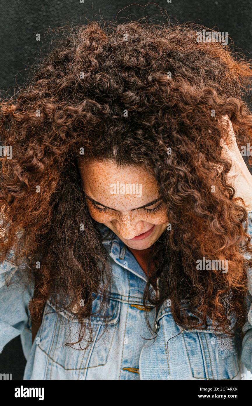 Hand curly woman hi-res stock photography and images - Alamy