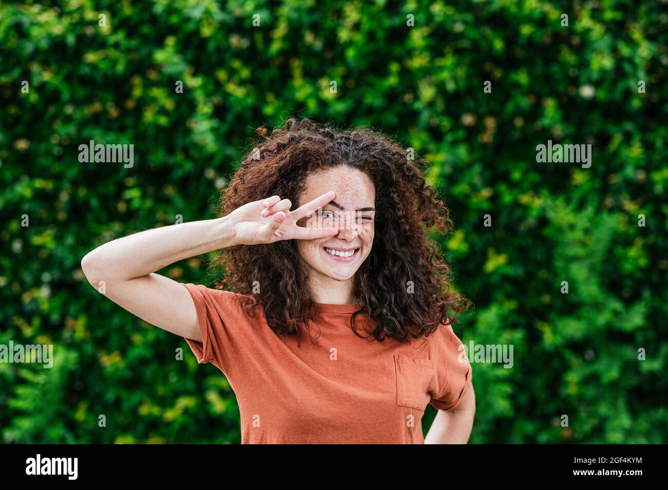 Woman winking and smiling hi-res stock photography and images - Alamy