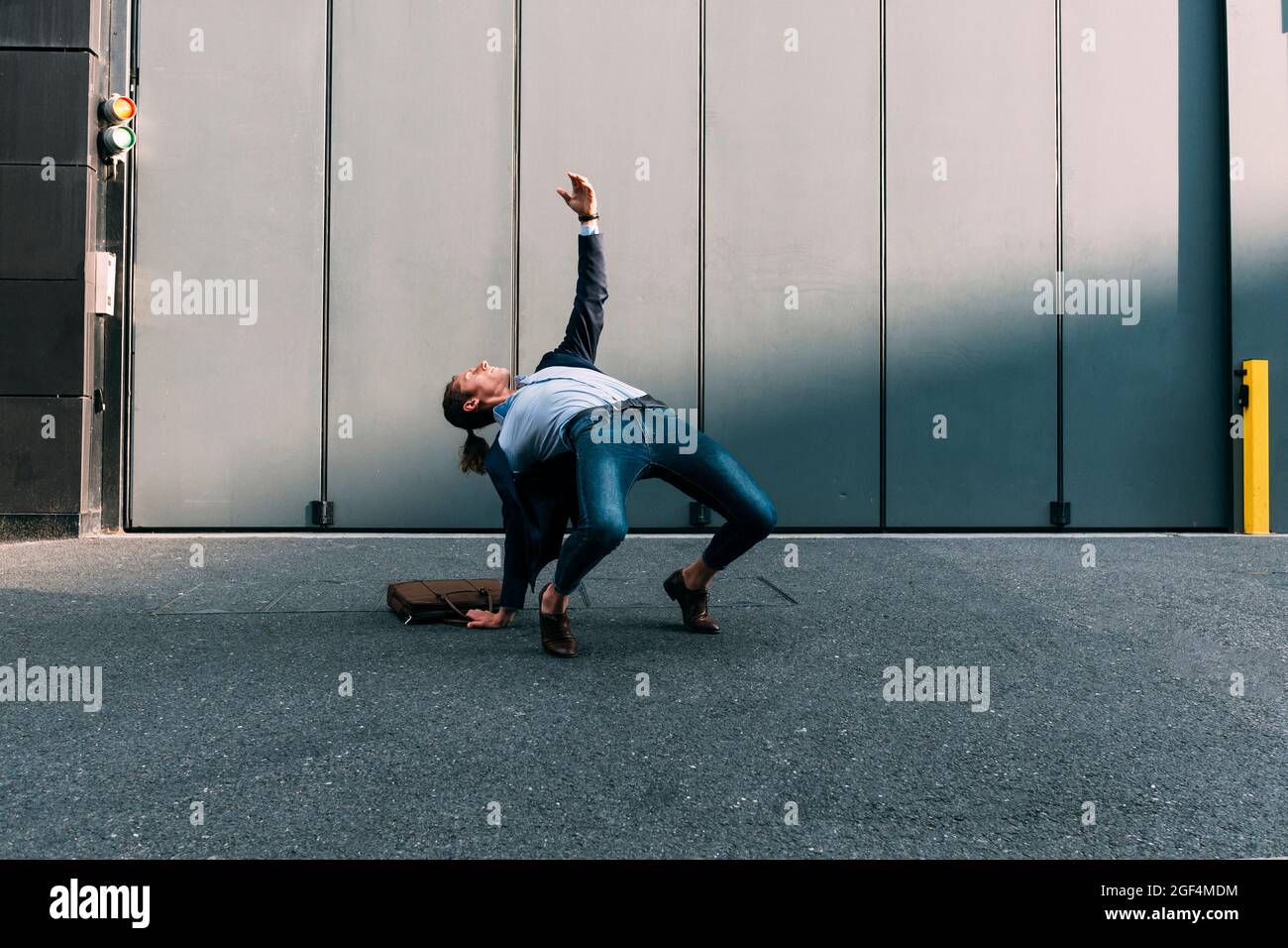 Person bending over hi-res stock photography and images - Alamy
