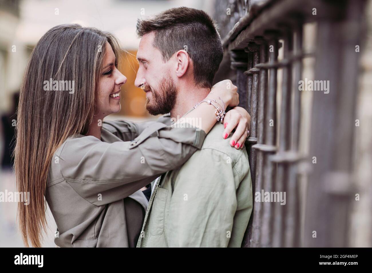 Mid adult couple face to face arm around hi-res stock photography and ...