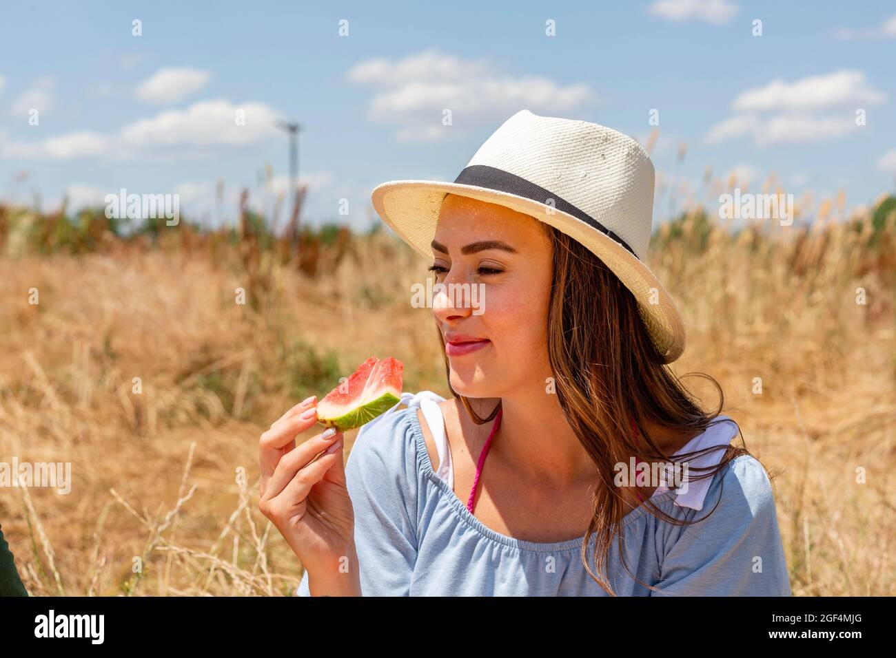 Woman eating hat hi-res stock photography and images - Alamy