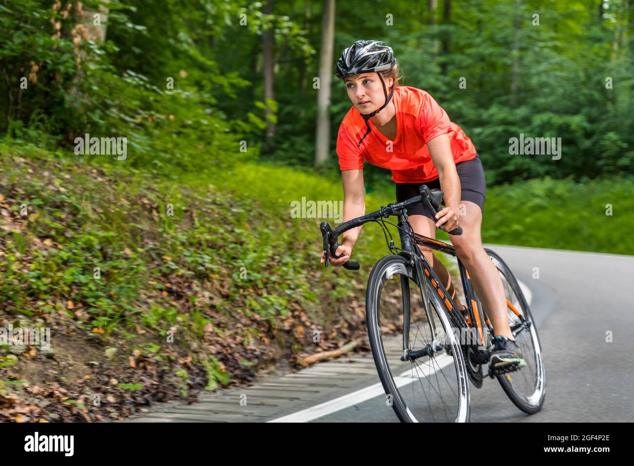 Female athlete cycling hi-res stock photography and images - Alamy