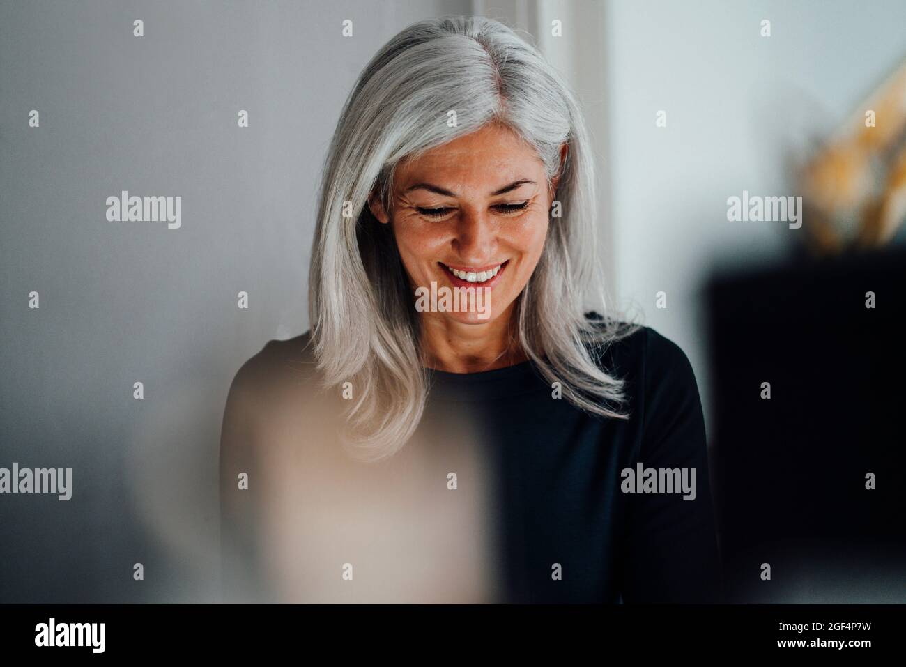Mature female professional working hi-res stock photography and images ...