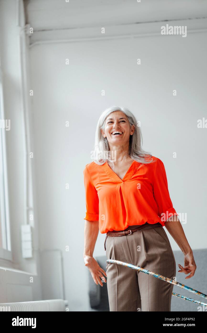 Woman hula hoop office hi-res stock photography and images - Alamy