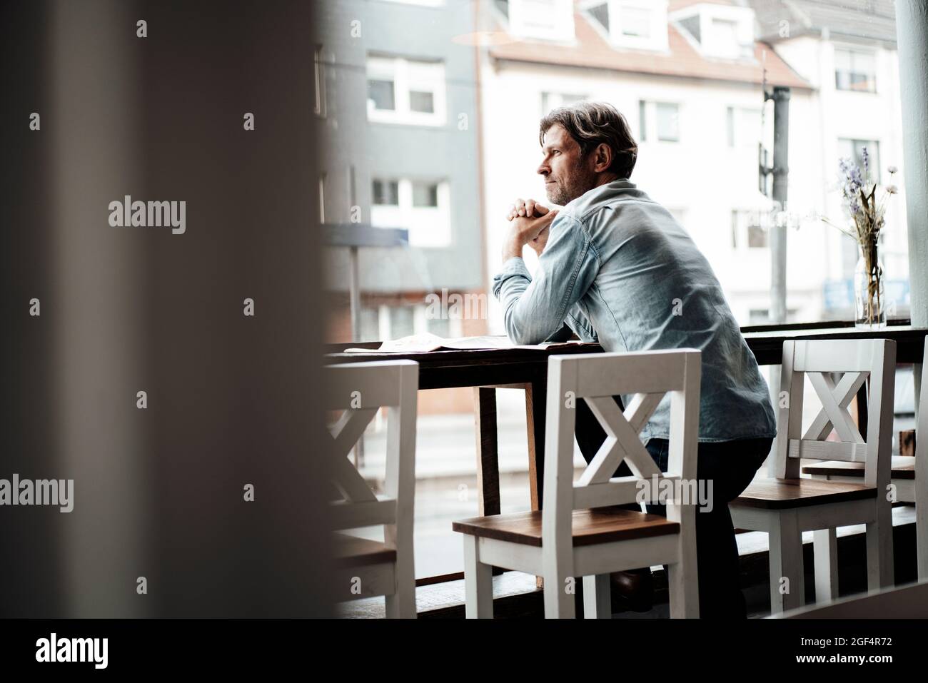 Standing on transparent glass table hi-res stock photography and images ...