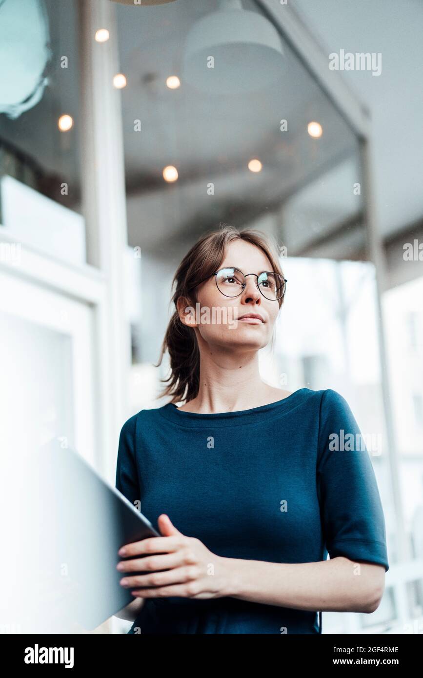 Young freelancer wearing wireless hi-res stock photography and images ...