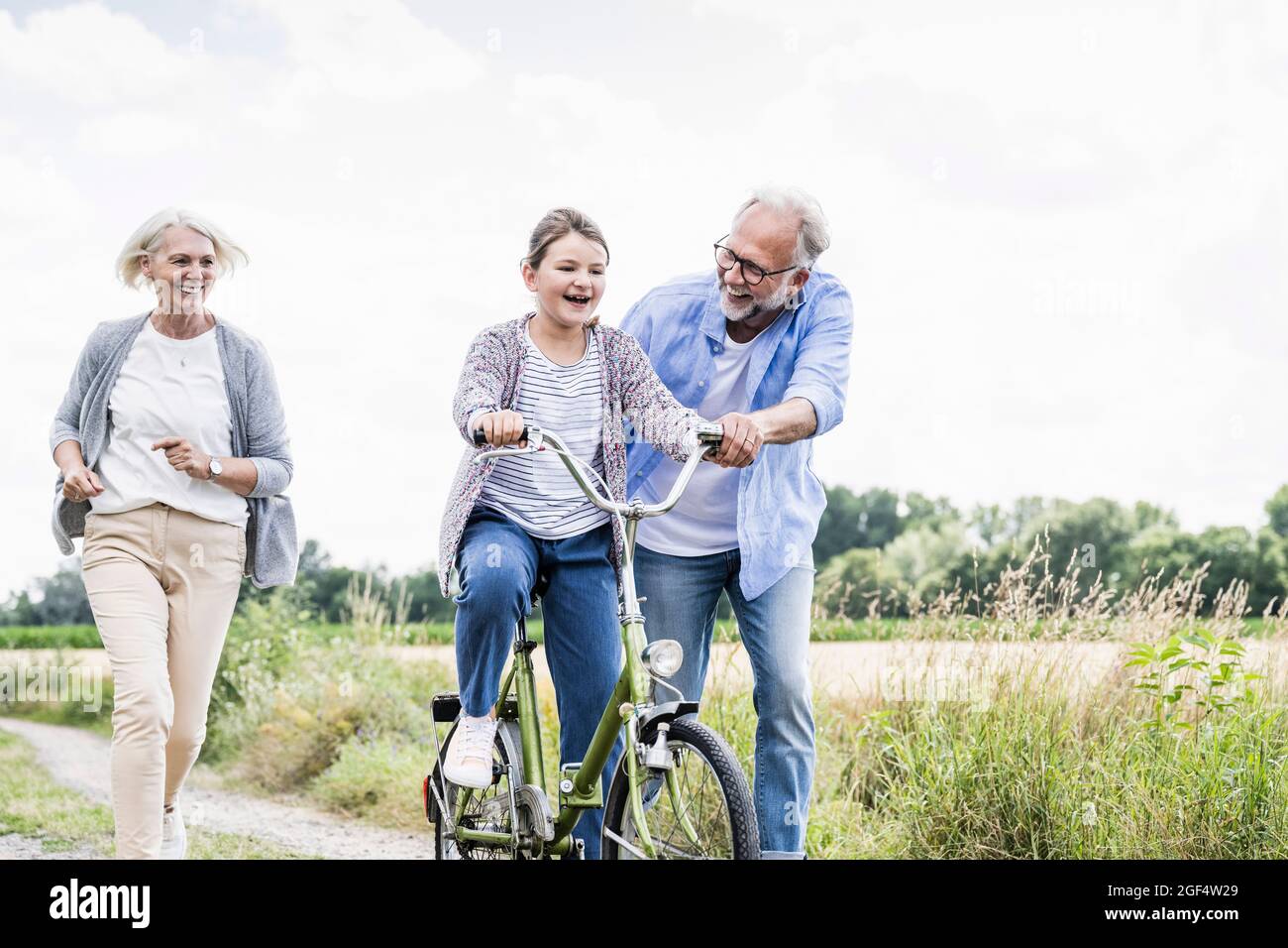 Girl female ride bike bicycle hi-res stock photography and images - Alamy