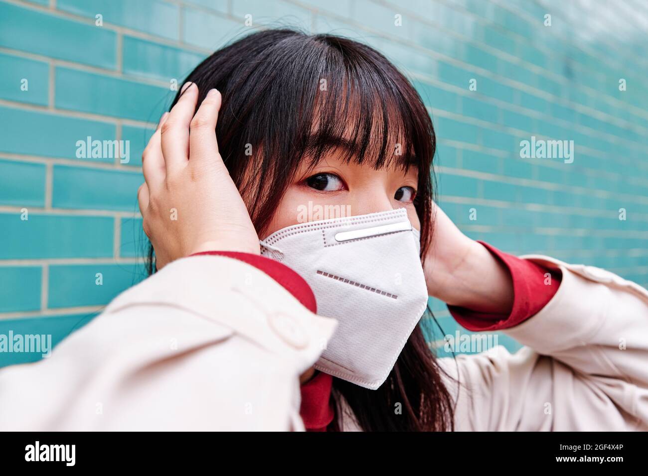 Close up woman covering ears hi-res stock photography and images - Alamy