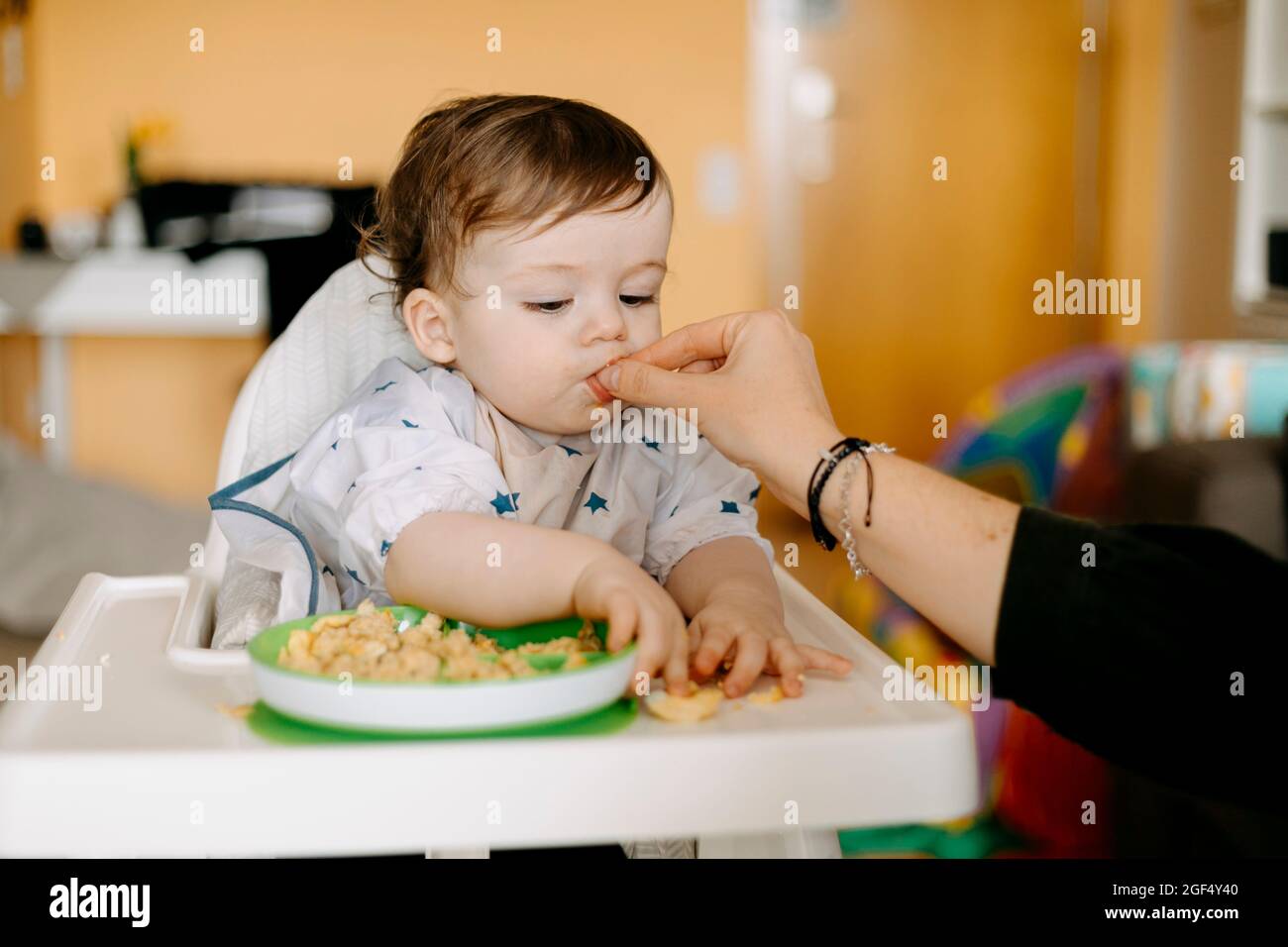 Baby boy feeding hi-res stock photography and images - Alamy
