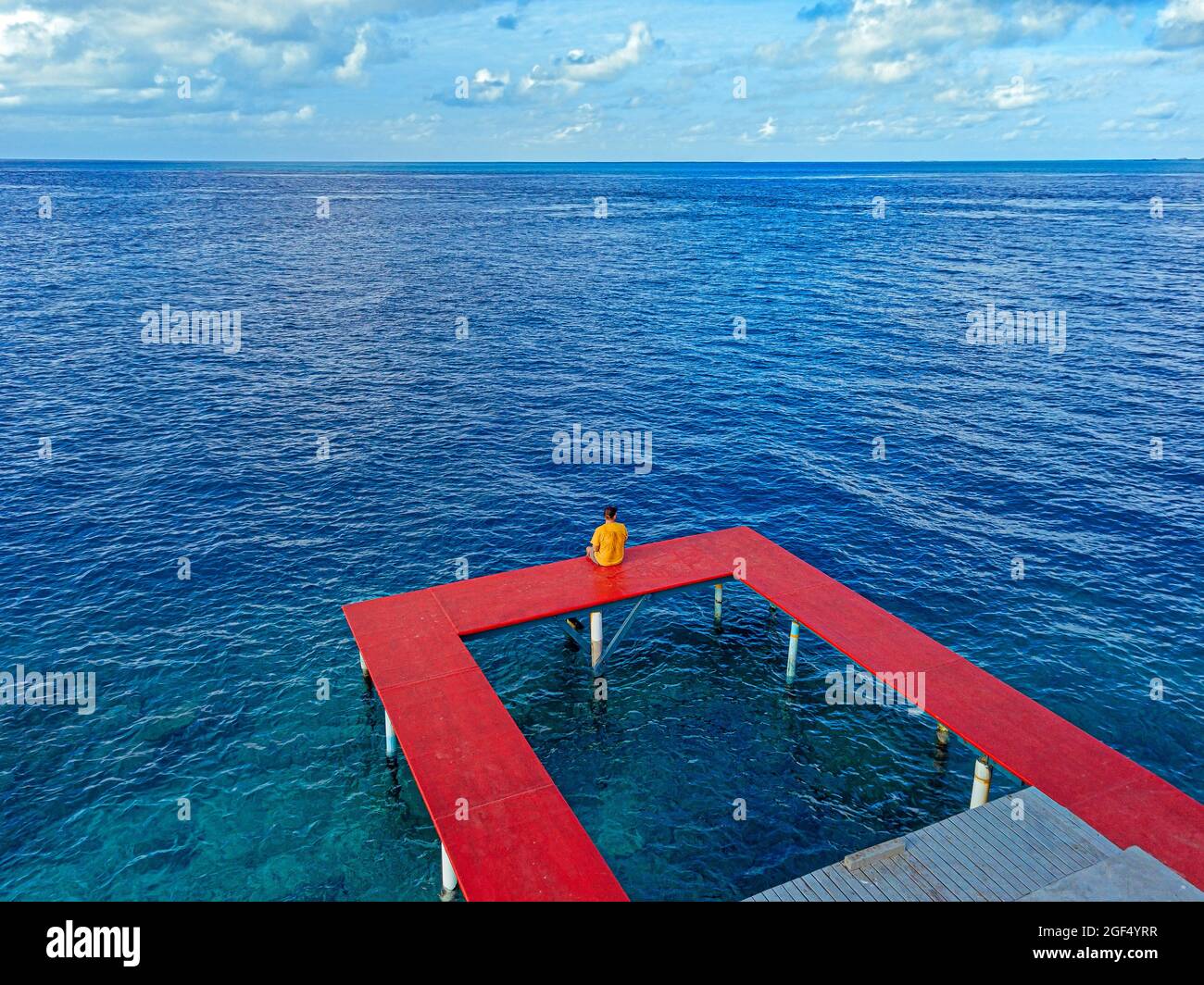 Man sitting red pier thulusdhoo island kaafu atoll hi-res stock ... Man sitting red pier thulusdhoo island kaafu atoll hi-res stock ...
