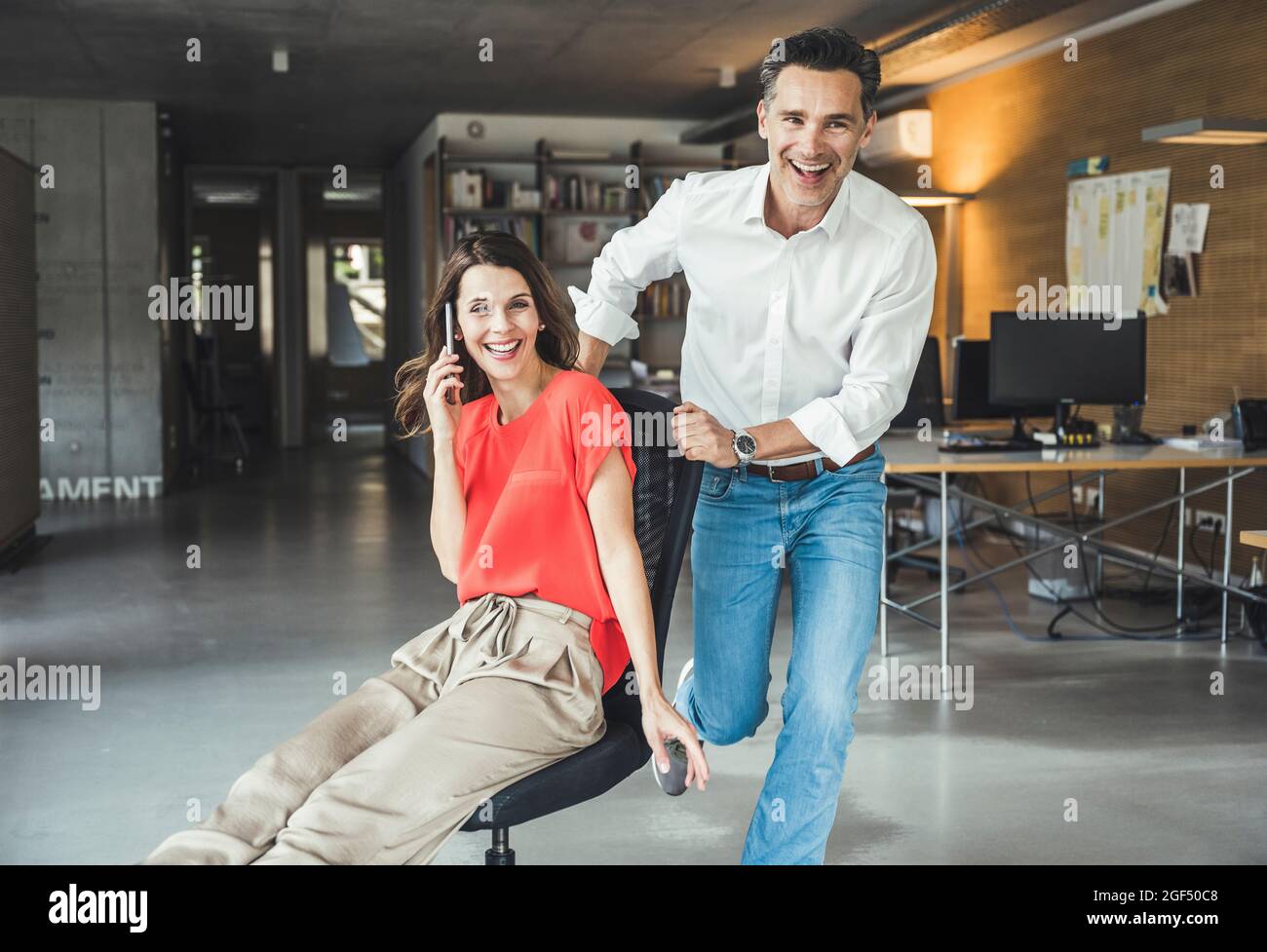Spinning on chair hi-res stock photography and images - Alamy
