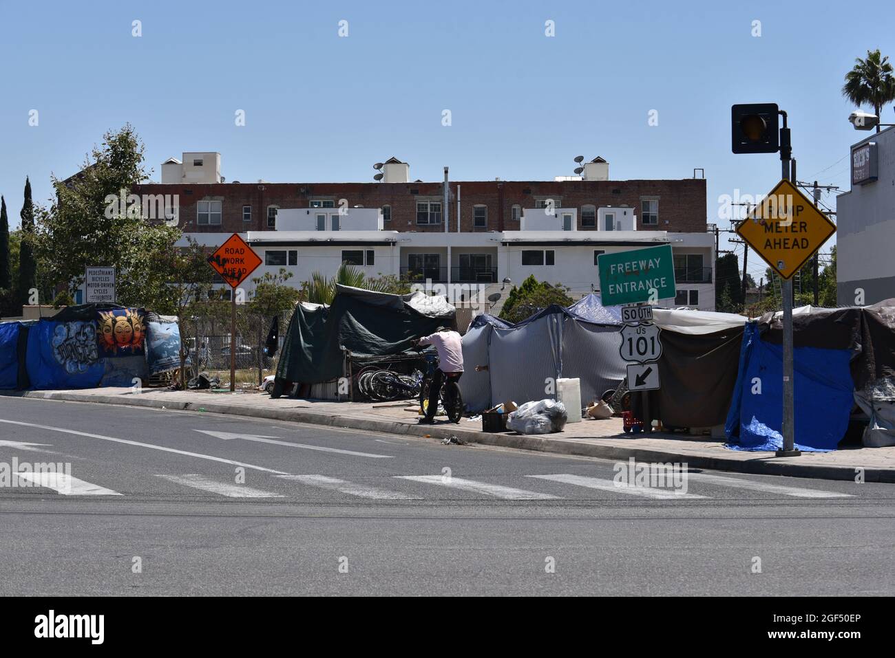 Los Angeles, CA USA - June 30, 2021: Homeless encampment alongside the ...