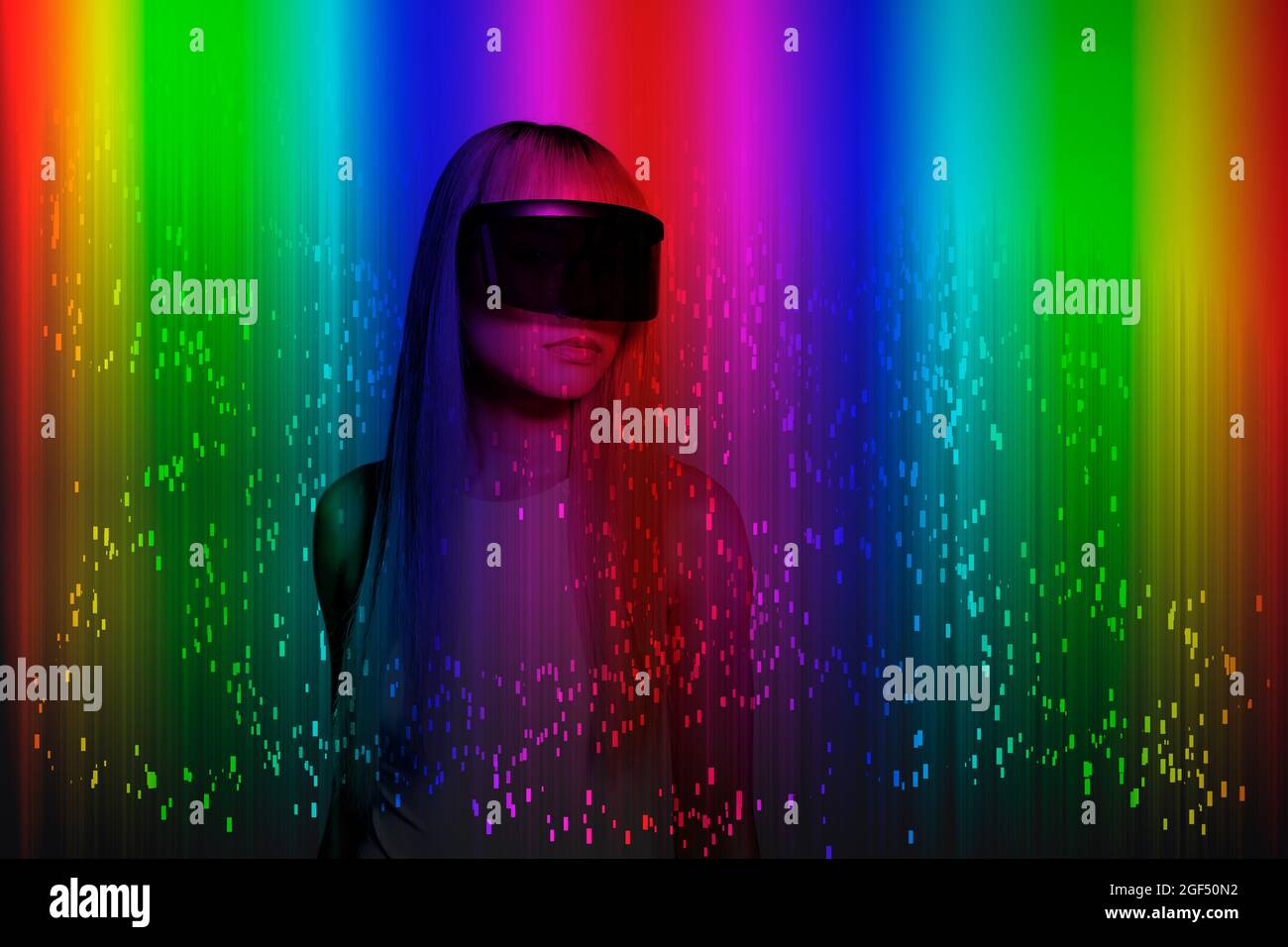 Woman wearing virtual visor glasses against colored background Stock ...