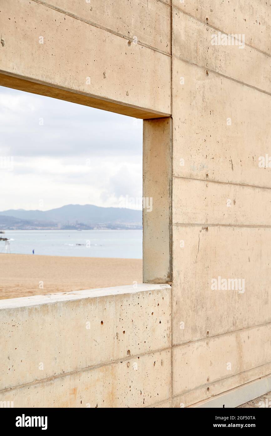 Beach seen through window on wall Stock Photo - Alamy