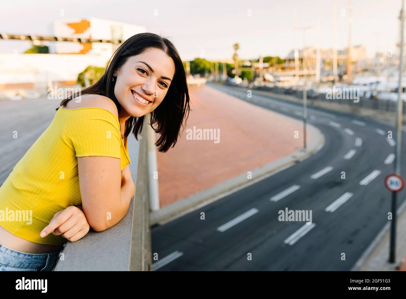 Women standing by bridge railing hi-res stock photography and images ...