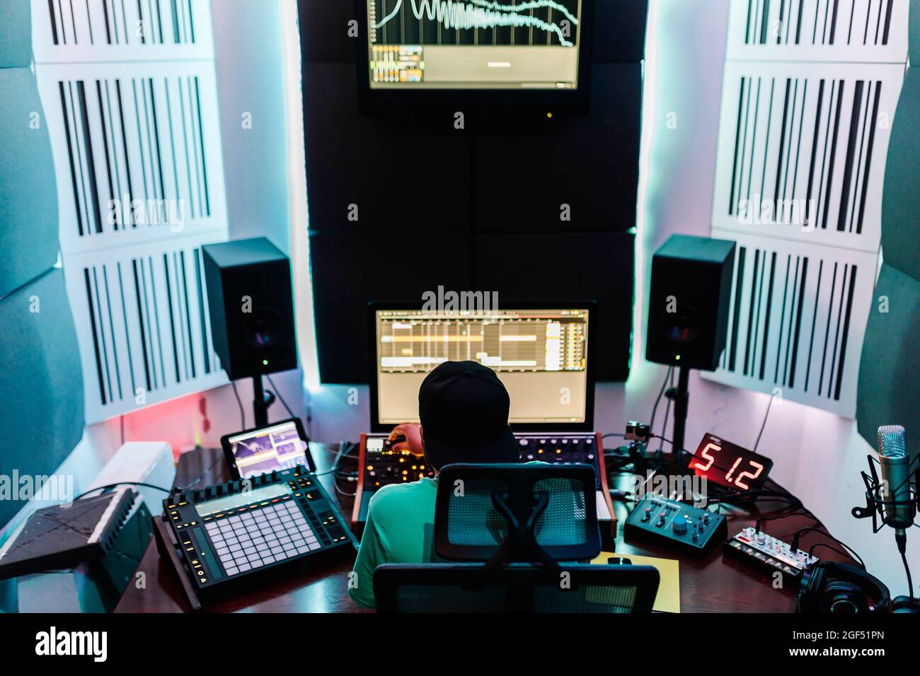 DJ mixing music on equipment in recording studio Stock Photo - Alamy