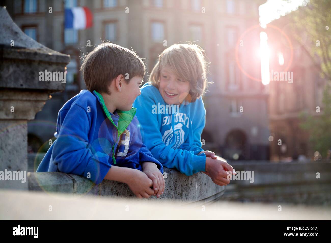 Two boys talking hi-res stock photography and images - Alamy