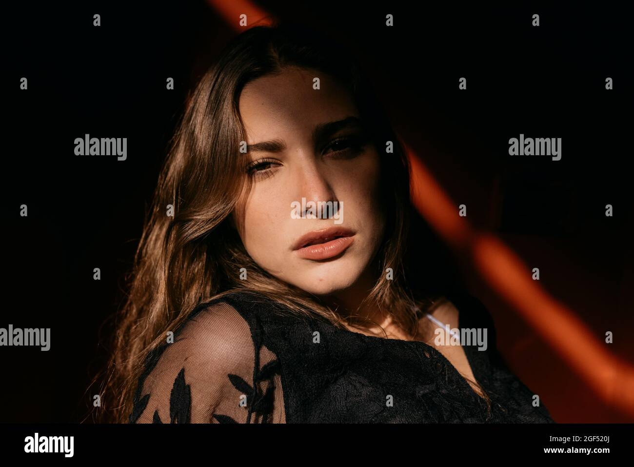 Sensual young beautiful woman with sunlight on face Stock Photo - Alamy