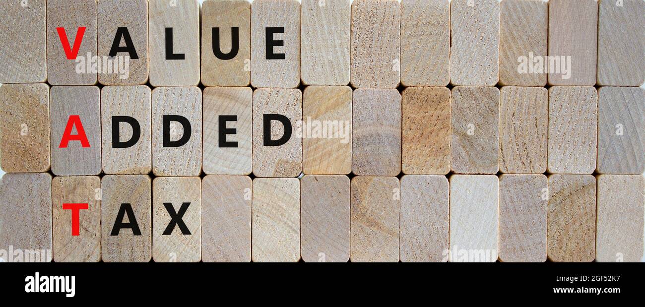 VAT, value added tax symbol. Wooden blocks with concept words 'VAT ...