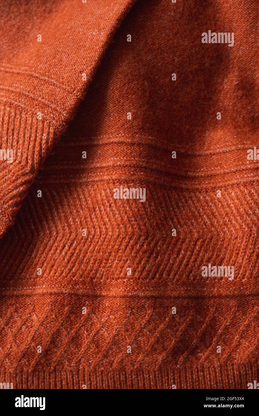 Texture of an autumn knitted sweater with pattern. Autumn cozy ...