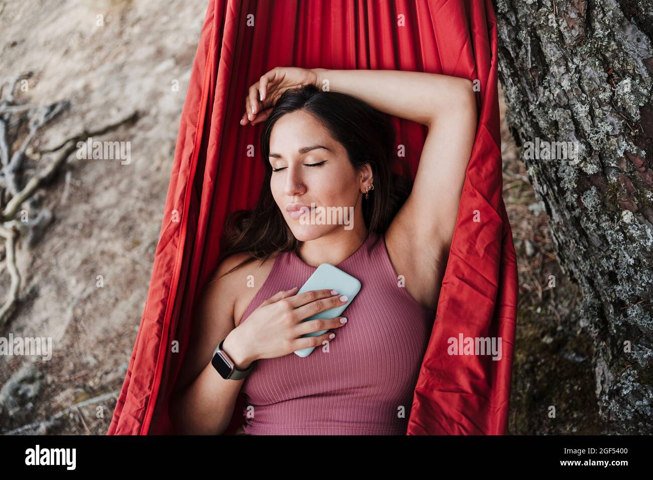 Woman sleeping mobile phone hi-res stock photography and images - Alamy