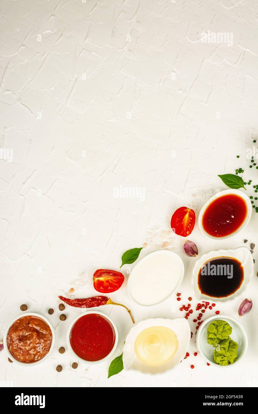 Set of different sauces - ketchup, mayonnaise, barbecue, soy, chutney ...