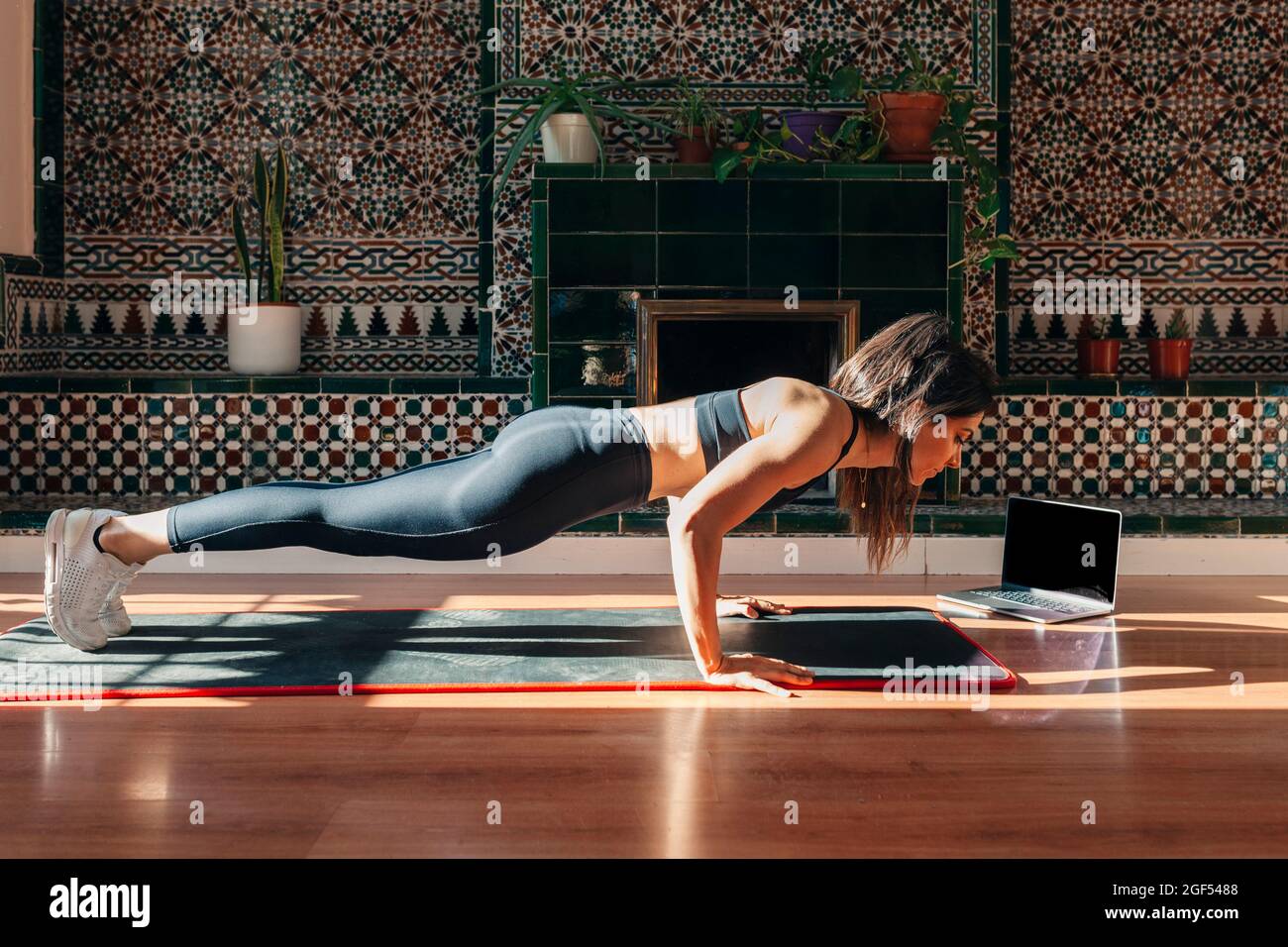 Woman working out home laptop hi-res stock photography and images - Alamy