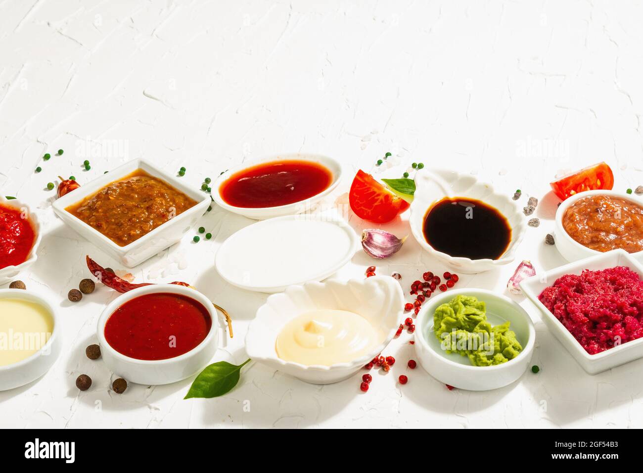 Set of different sauces - ketchup, mayonnaise, barbecue, soy, chutney ...