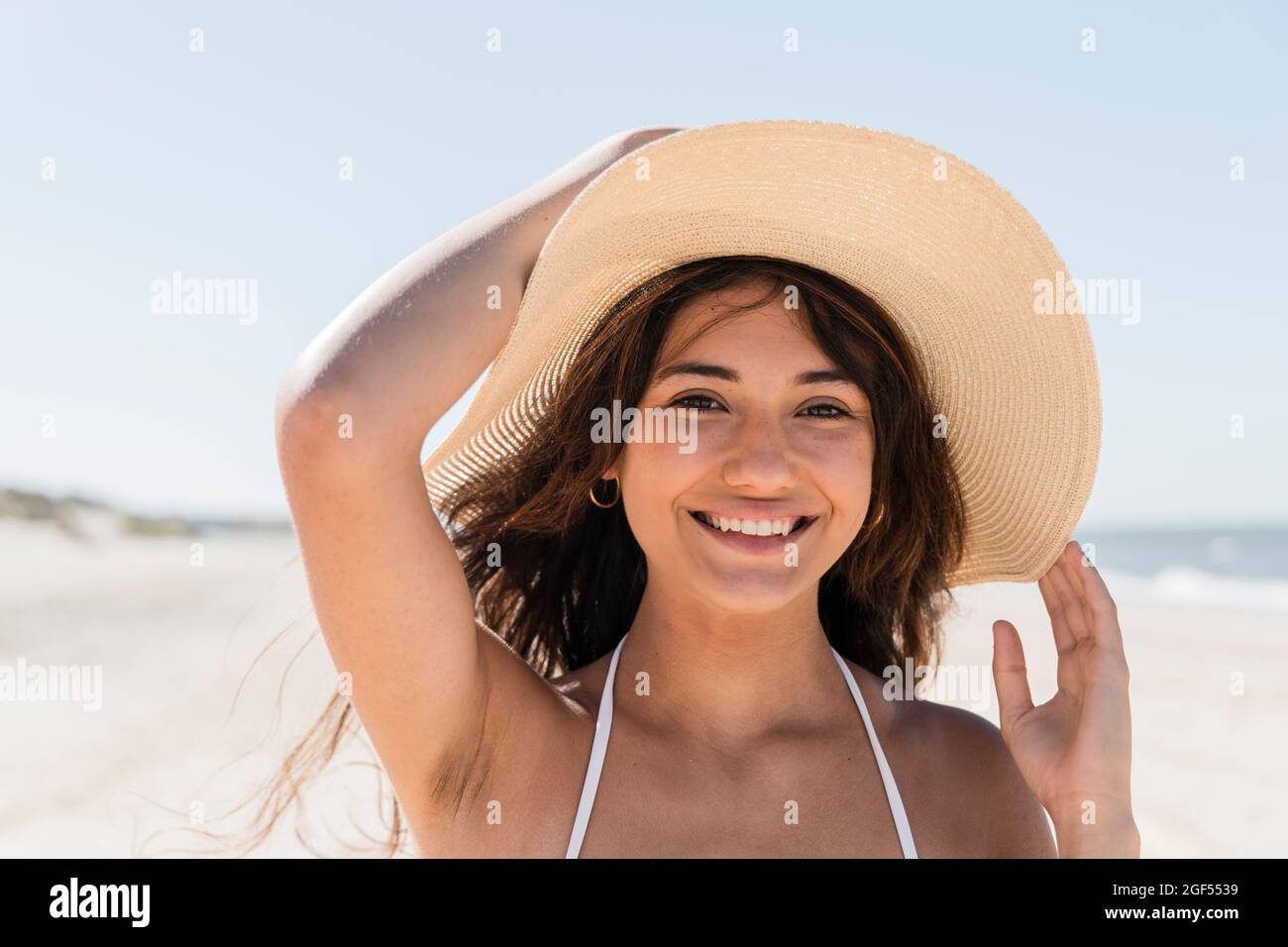 Beautiful female enjoying vacation beach hi-res stock photography and images - Alamy