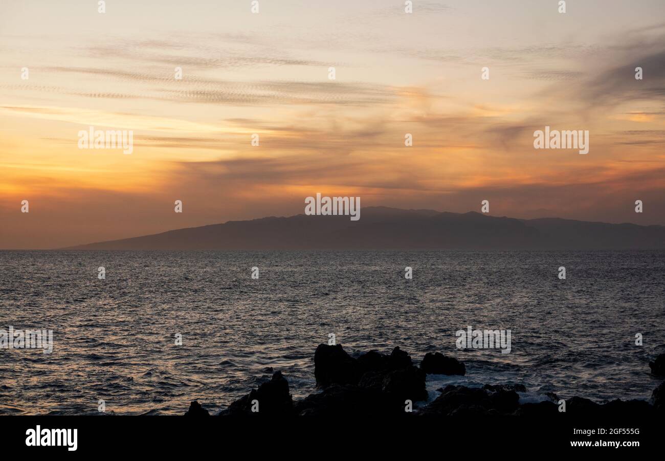 Beautiful Sunset in Playa de San Juan coast, with view on the La Gomera ...