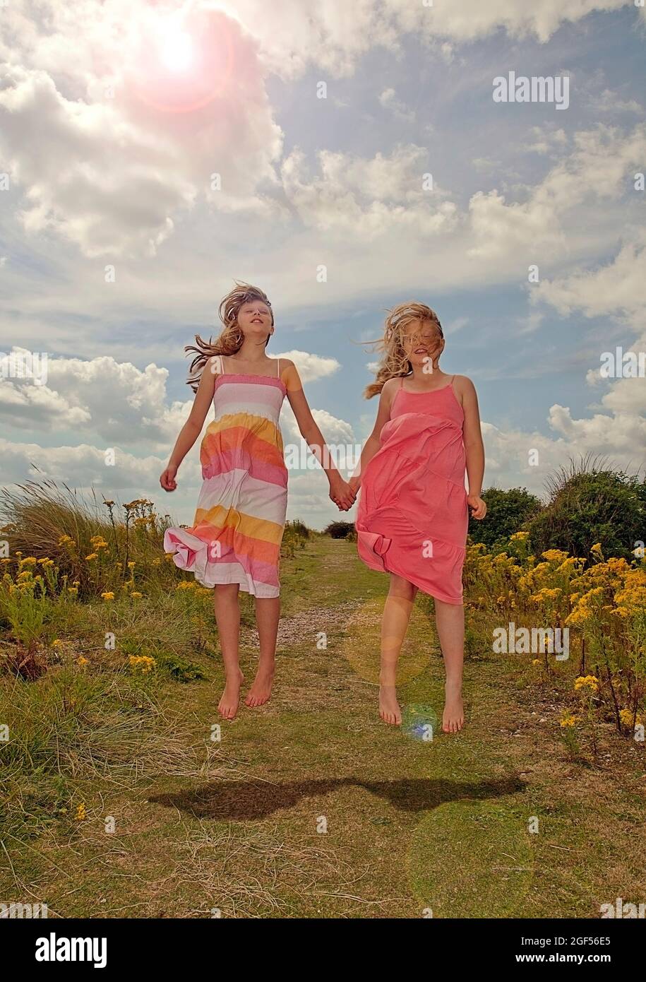 Children playing holding hands 12 years hi-res stock photography and ...